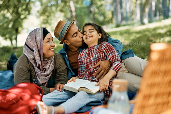 Loving Middle Eastern family enjoying in picnic day in nature. Stock ...
