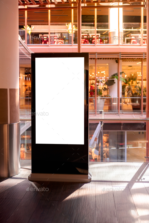 Vertical sign mockup of billboard advertisement in shopping mall. Mock ...