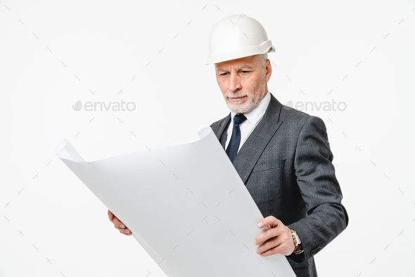 Senior construction worker engineer in formal suit and hardhat with ...
