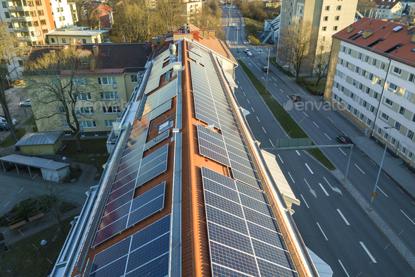 Aerial view of solar photo voltaic panels system on apartment building ...