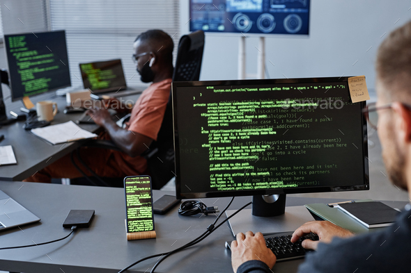 Green Code Lines On Computer Screen Stock Photo by seventyfourimages