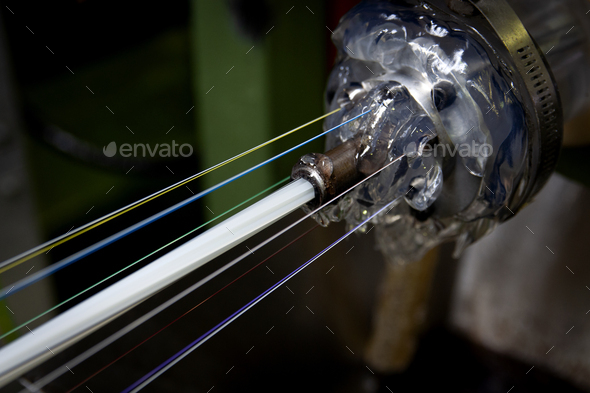 Fiber optic cable production machine, line in a factory. Production of ...