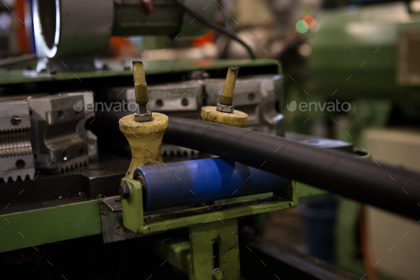 Fiber optic cable production machine, line in a factory. Production of ...