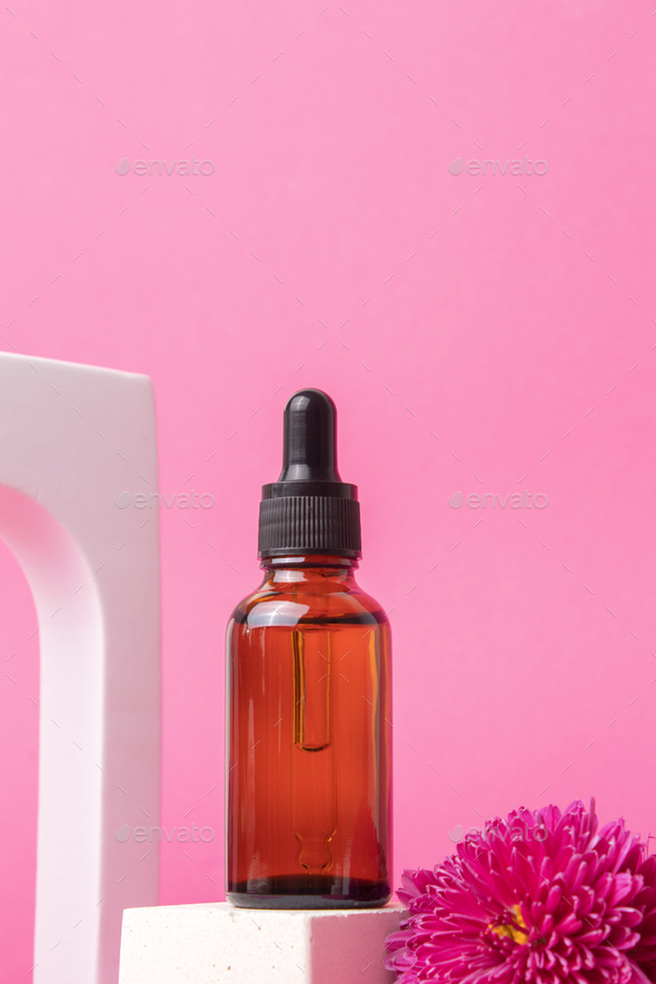 Serum with floral extracts for skincare in arch. Nature cosmetics in ...