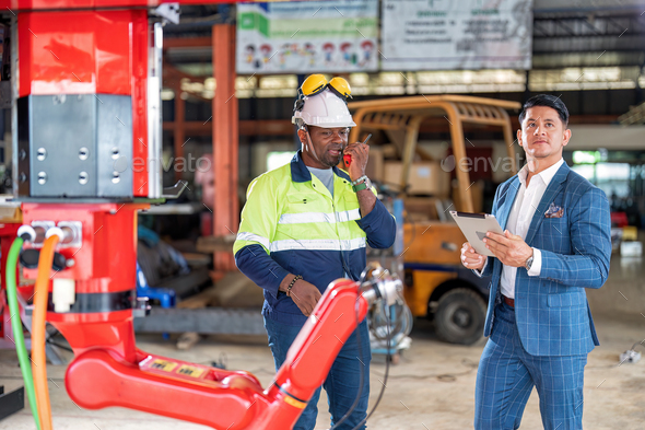 Engineer customer service explain introduction of new design robotic ...