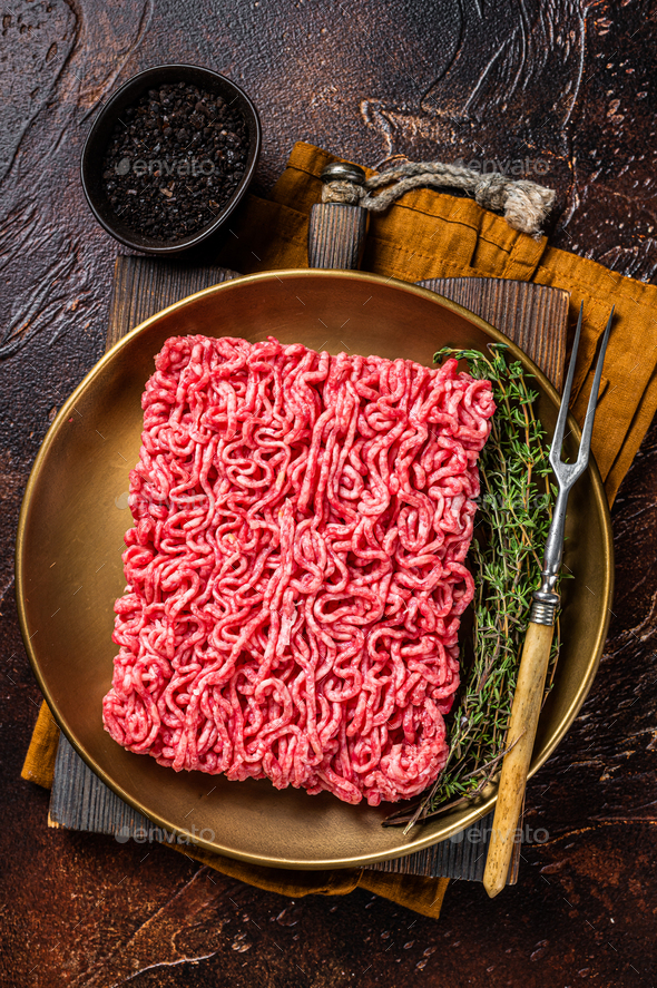 Fresh mutton lamb Mince Meat, raw ground meat. Dark background. Top ...
