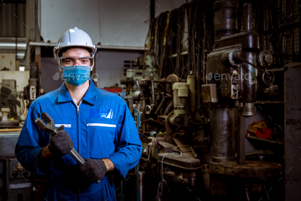 Portrait man worker under inspection and checking production process on ...