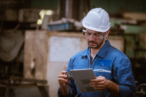 Engineer worker wearing safety uniform control operating computer ...