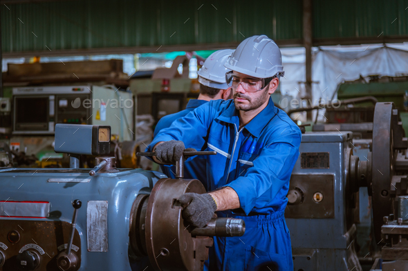 Engineer worker wearing safety uniform control operating computer ...