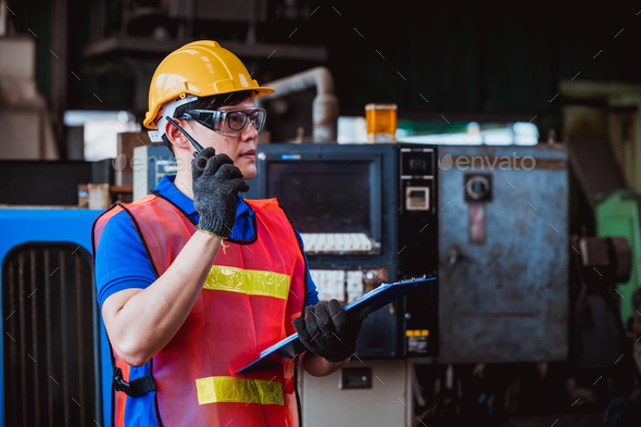 Engineer worker wearing safety uniform control operating computer ...