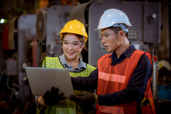 Engineer worker wearing safety uniform control operating computer ...