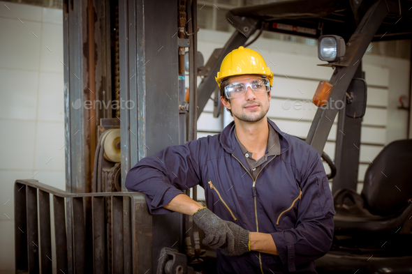 Portrait worker industry factory wear safety uniform factory drive a ...