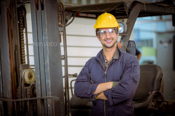 Portrait worker industry factory wear safety uniform factory drive a ...