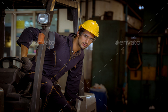 Portrait worker industry factory wear safety uniform factory drive a ...