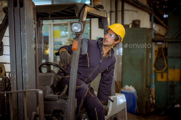 Portrait worker industry factory wear safety uniform factory drive a ...