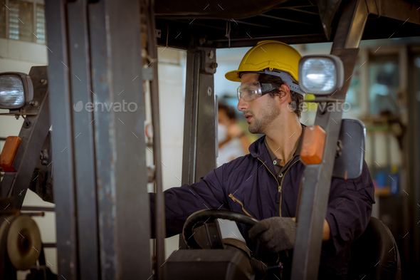 Portrait worker industry factory wear safety uniform factory drive a ...