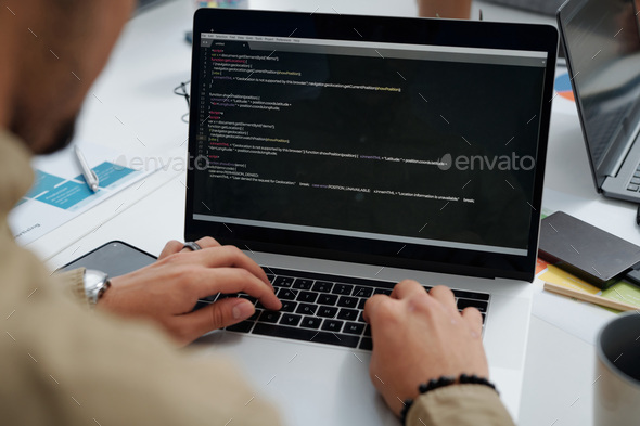 Developer writing codes on computer Stock Photo by AnnaStills | PhotoDune
