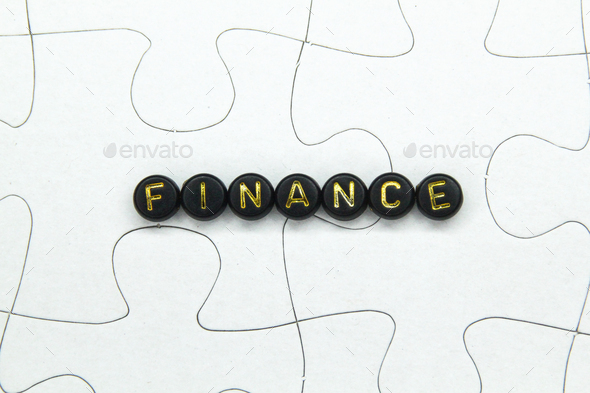 the word Finance is gold on the black circle Stock Photo by fauziEv8