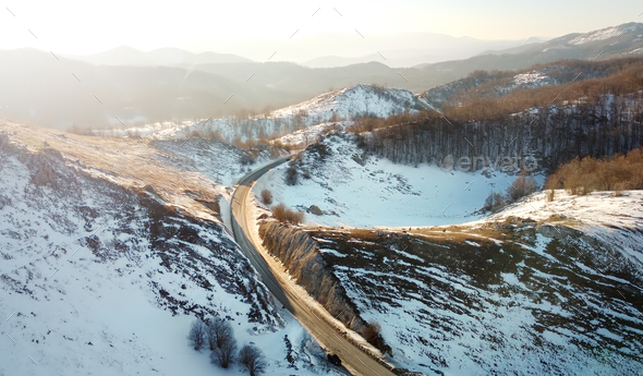 Amazing sunset aerial top drone view of high-speed road between the ...
