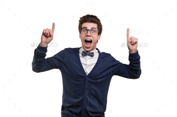 Excited male student pointing up Stock Photo by kegfire | PhotoDune