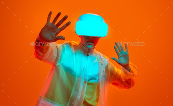 Futuristic gamer exploring virtual reality Stock Photo by kegfire ...