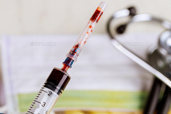 Laboratory real blood sample medical syringe with red blood Stock Photo ...