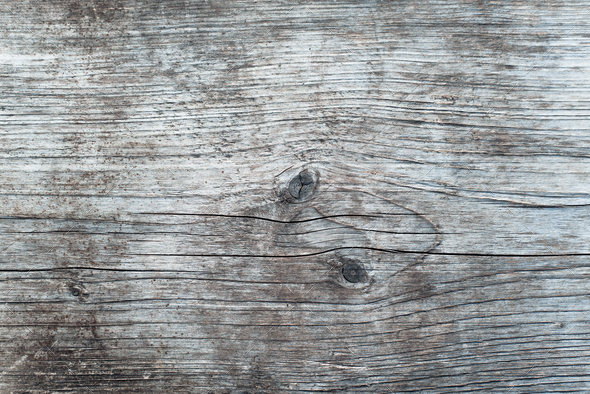 Old gray wood plank, textured wood surface with cracks and knots, rough ...