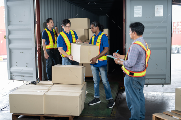 Workers open steel 40 feet container doors carry box supervisor ...