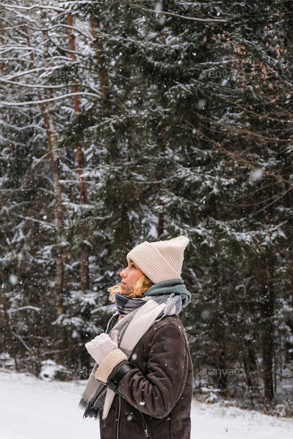 Winter.woman walks through winter snowy forest. Mental and physical ...