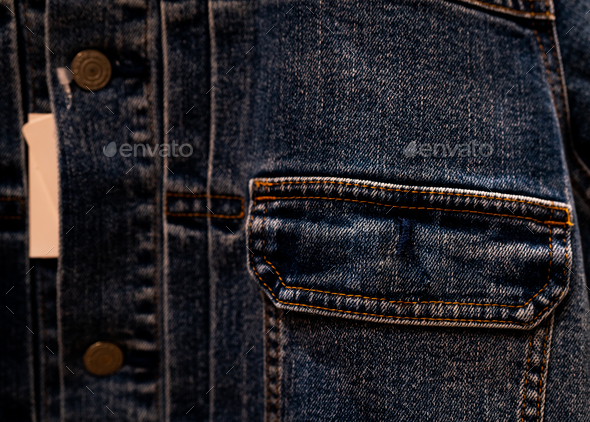 Selective focus on denim jean jacket pocket in clothes shop. Denim ...