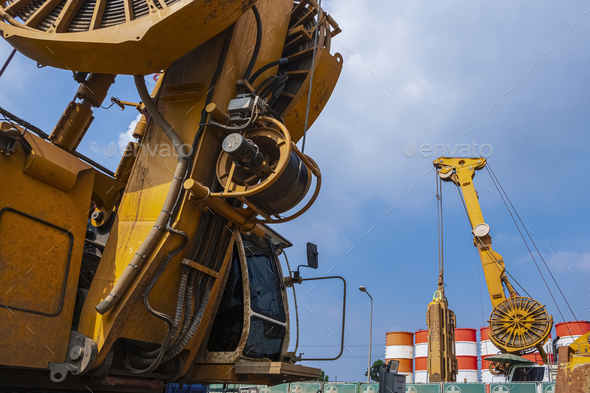 Piling crawler cranes drilling hole for install overpass foundations in ...