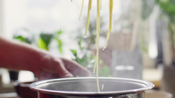 Putting Cooked Spaghetti in Colander, Stock Footage | VideoHive