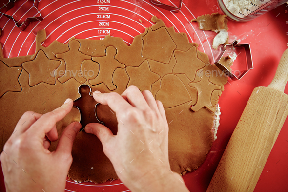 Process of woman making gingerbread cookies at home Stock Photo by Lazy ...