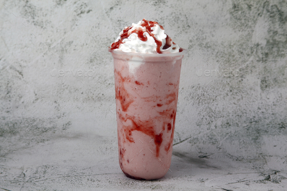 Freshly made strawberry flavored iced frappe Stock Photo by junpinzon