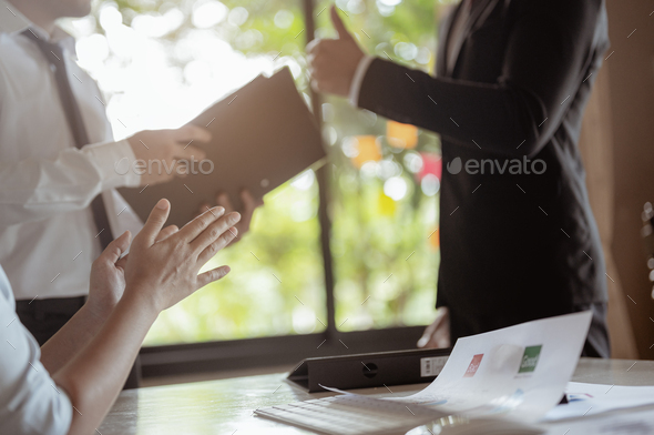 Great job! manager / boss praising the staff employee in the office ...