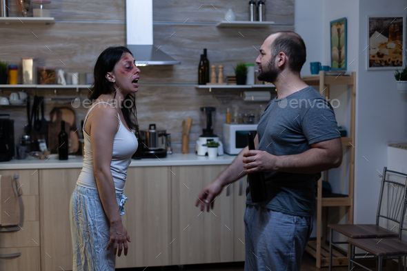Husband and wife fighting and screaming at home Stock Photo by DC_Studio