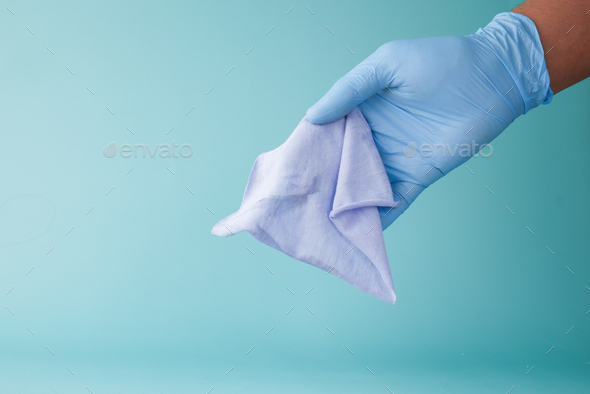 close up of person hand cleaning table with cloth Stock Photo by towfiqu98