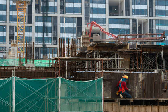 Construction workers fabricating steel reinforcement bar at the ...