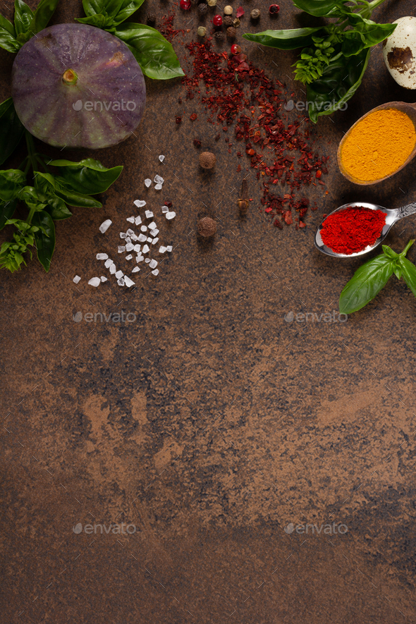 Variety of spices and herbs at table background. Cooking concept and ...