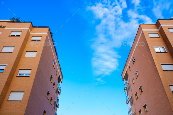 Blue sky, empty space between two residential buildings. Stock Photo by ...
