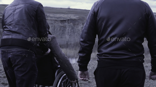 Gang of men in black jackets. Footage. Rear view of gang of gangsters ...
