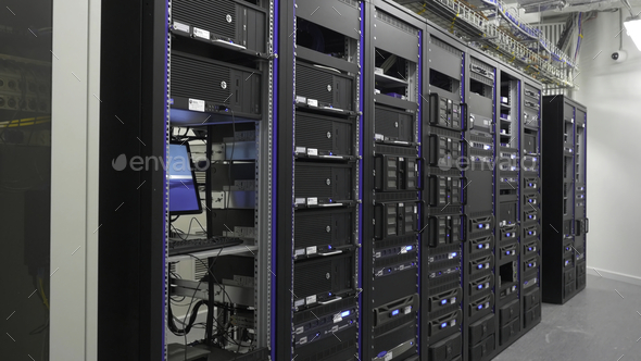 Many powerful servers running in the data center server room. Many ...
