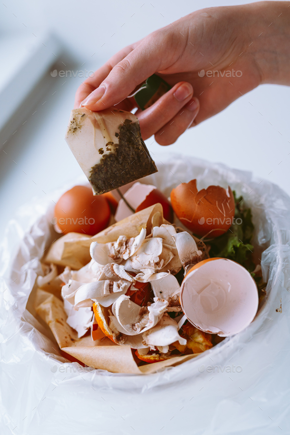 Bucket with food waste in kitchen Stock Photo by larisikstefania ...