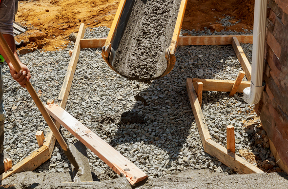 Building new concrete pavement for paving walkway. Stock Photo by photovs
