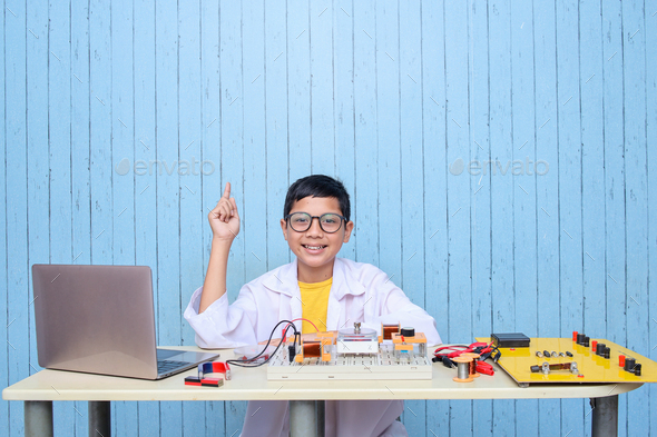 Stem Education. Smart boy learning about electrical Stock Photo by ...