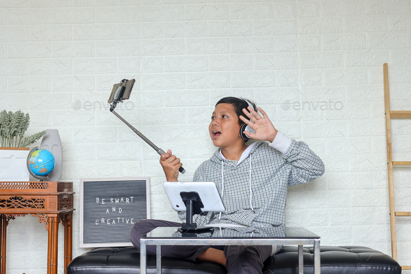 Asian boy young youtuber vlogger influencer Stock Photo by Garakta-Studio