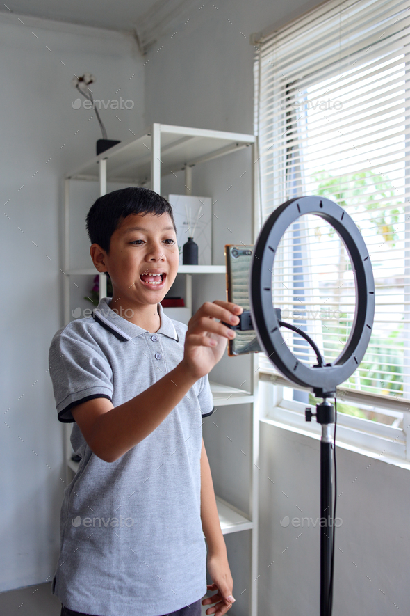 Asian boy young youtuber vlogger influencer Stock Photo by Garakta-Studio