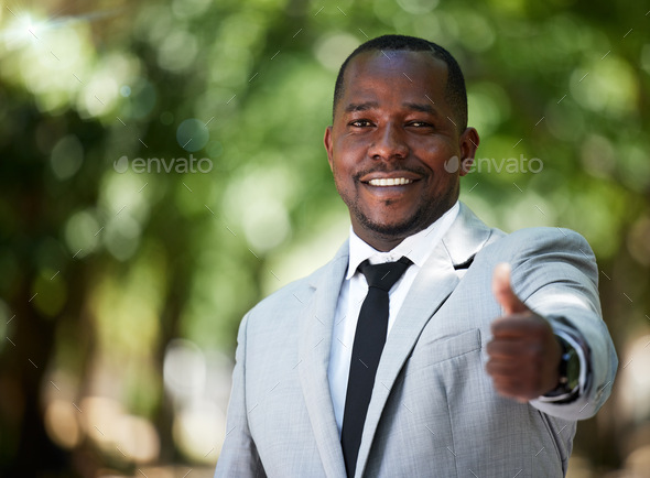 Portrait, smile and happy businessman with thumbs up for achievement ...