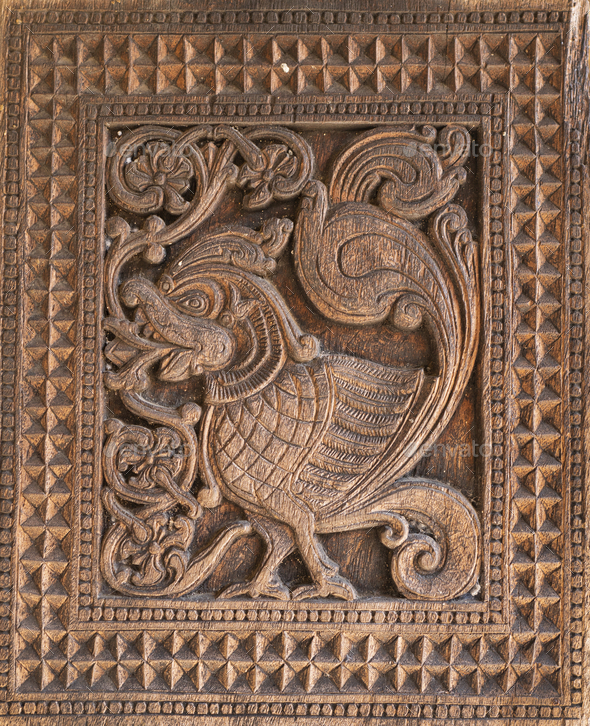 Traditional wood carvings of Embekka Devalaya Stock Photo by motion5