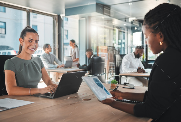 Happy, excited and smiling business woman working in a busy office ...